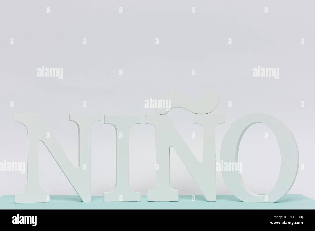 Beautiful Spanish "NINO" writing isolated on a white background Stock ...