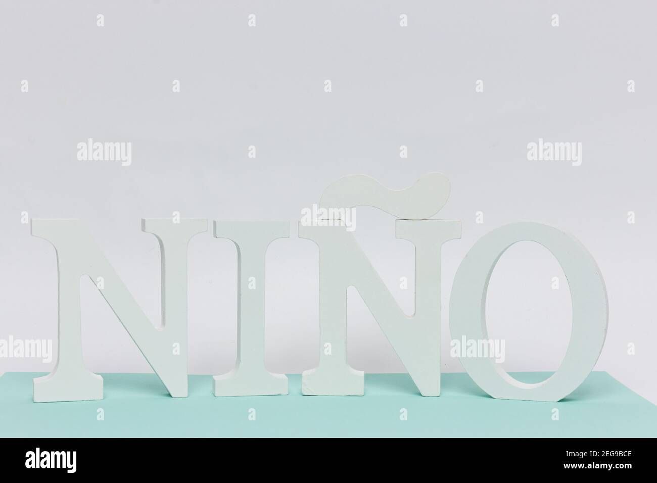 Beautiful Spanish "NINO" writing isolated on a white background Stock ...