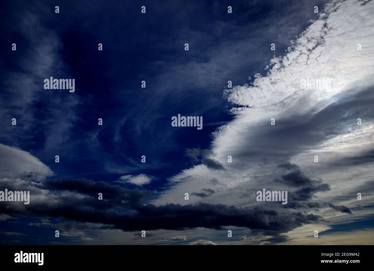 Sky with different types of clouds including a band of so called ...