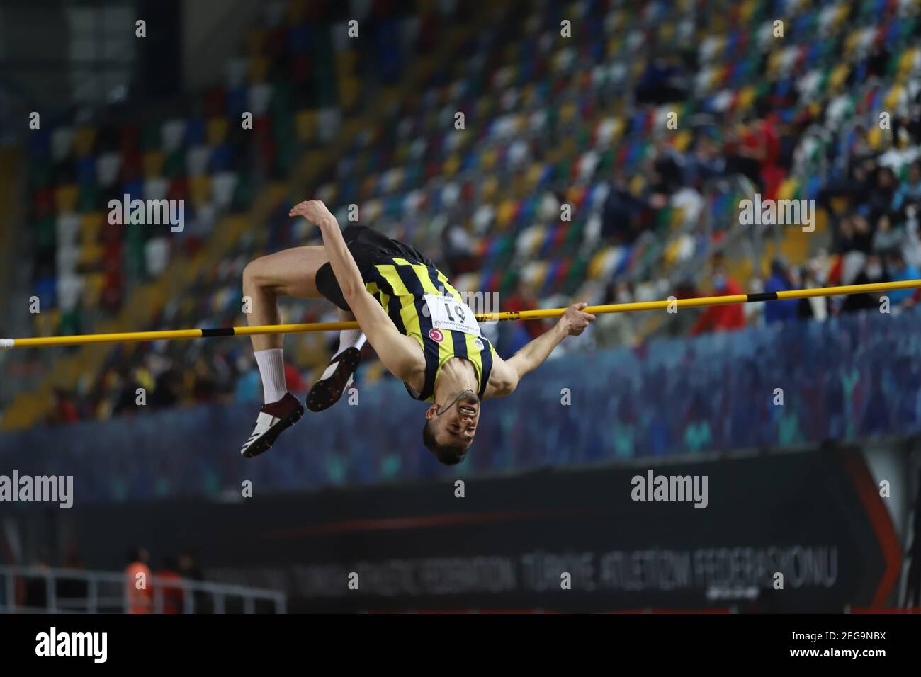 ISTANBUL, TURKEY - FEBRUARY 06, 2021: Undefined athlete high jumping ...