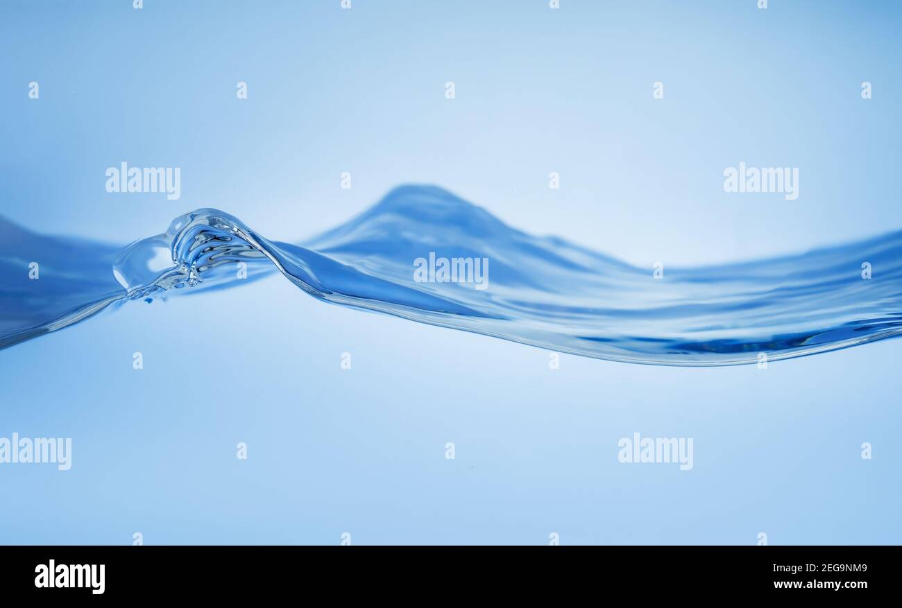 Side view of blue water waves Stock Photo - Alamy