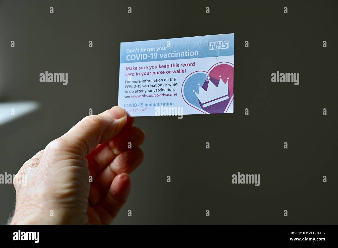 COVID-19 NHS Vaccination card Stock Photo - Alamy