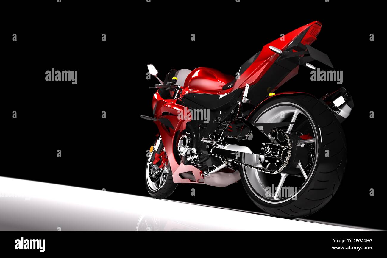 Side view of red sports motorcycle in a spotlight on a black background ...