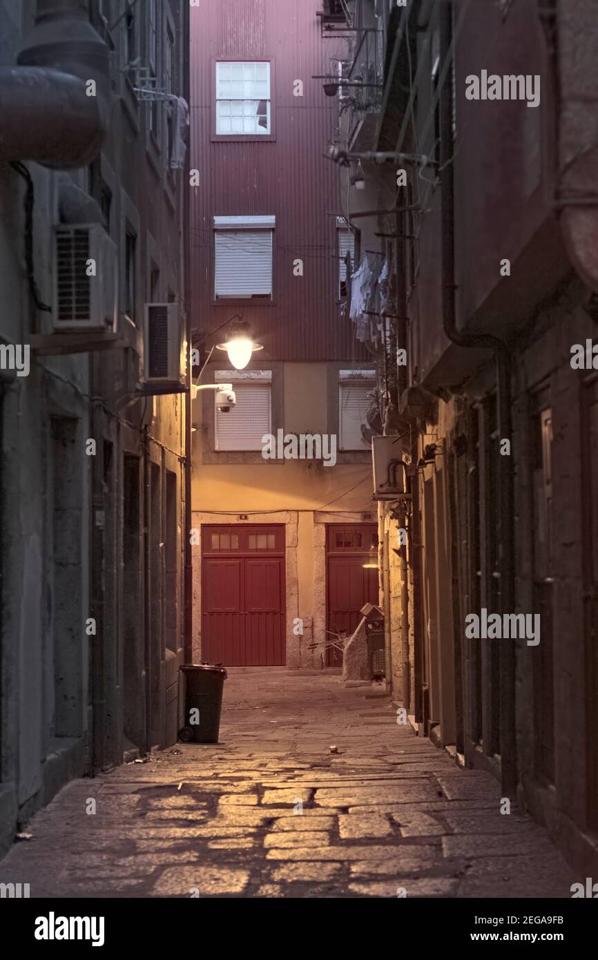 Old Porto grunge alley at dawn Stock Photo - Alamy