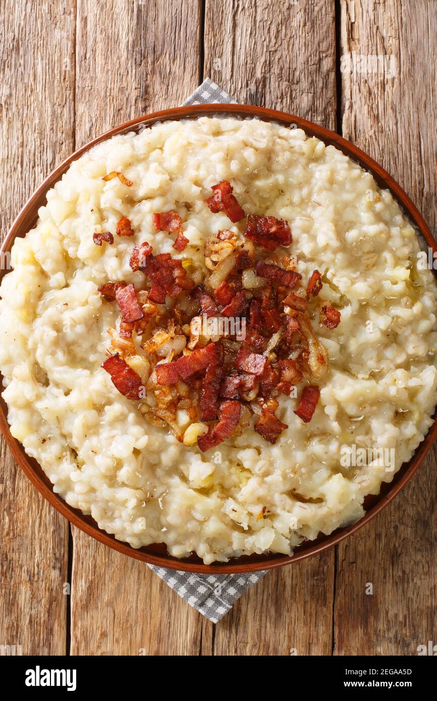 Estonian mashed potatoes with barley Mulgipuder closeup in the plate on ...