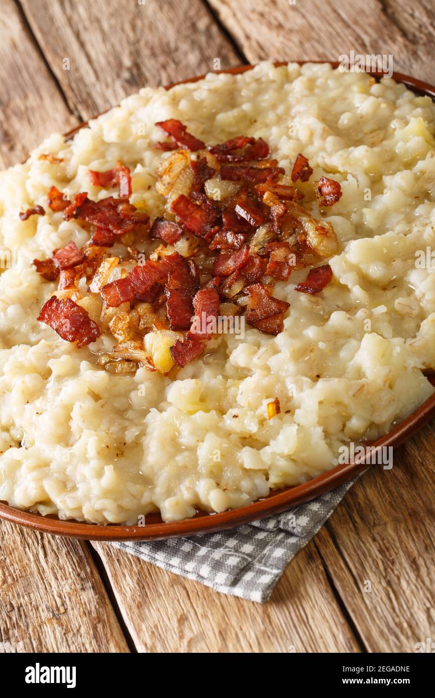 Estonian mashed potatoes with barley Mulgipuder closeup in the plate on ...