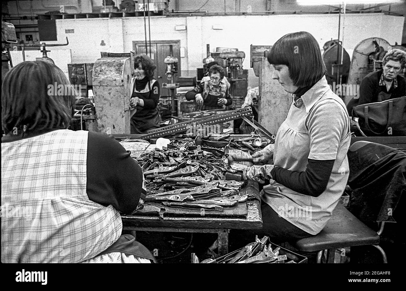 Women Sorting Parts in Wrench Factory Stock Photo - Alamy