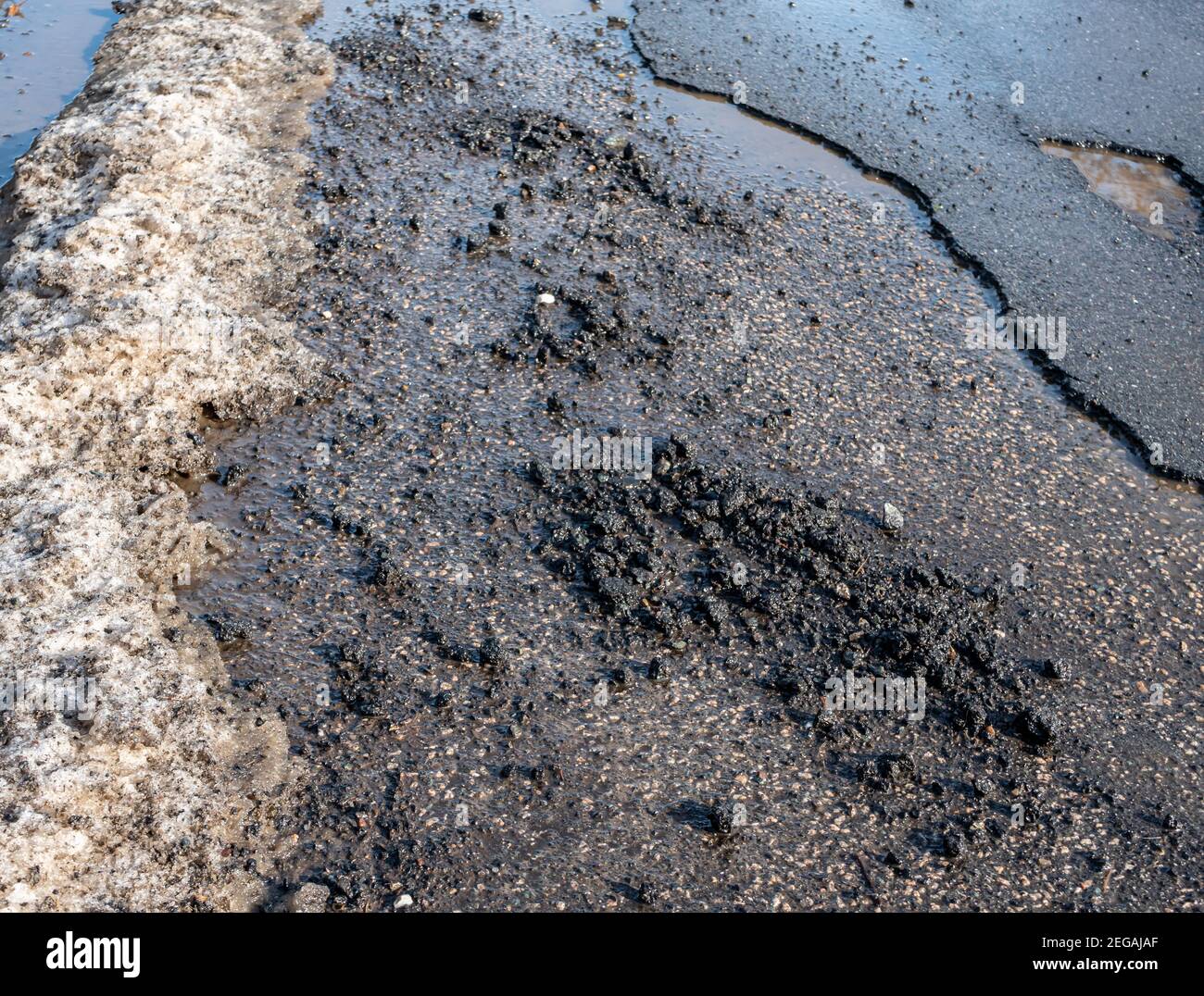 broken road through the frost in winter Stock Photo - Alamy