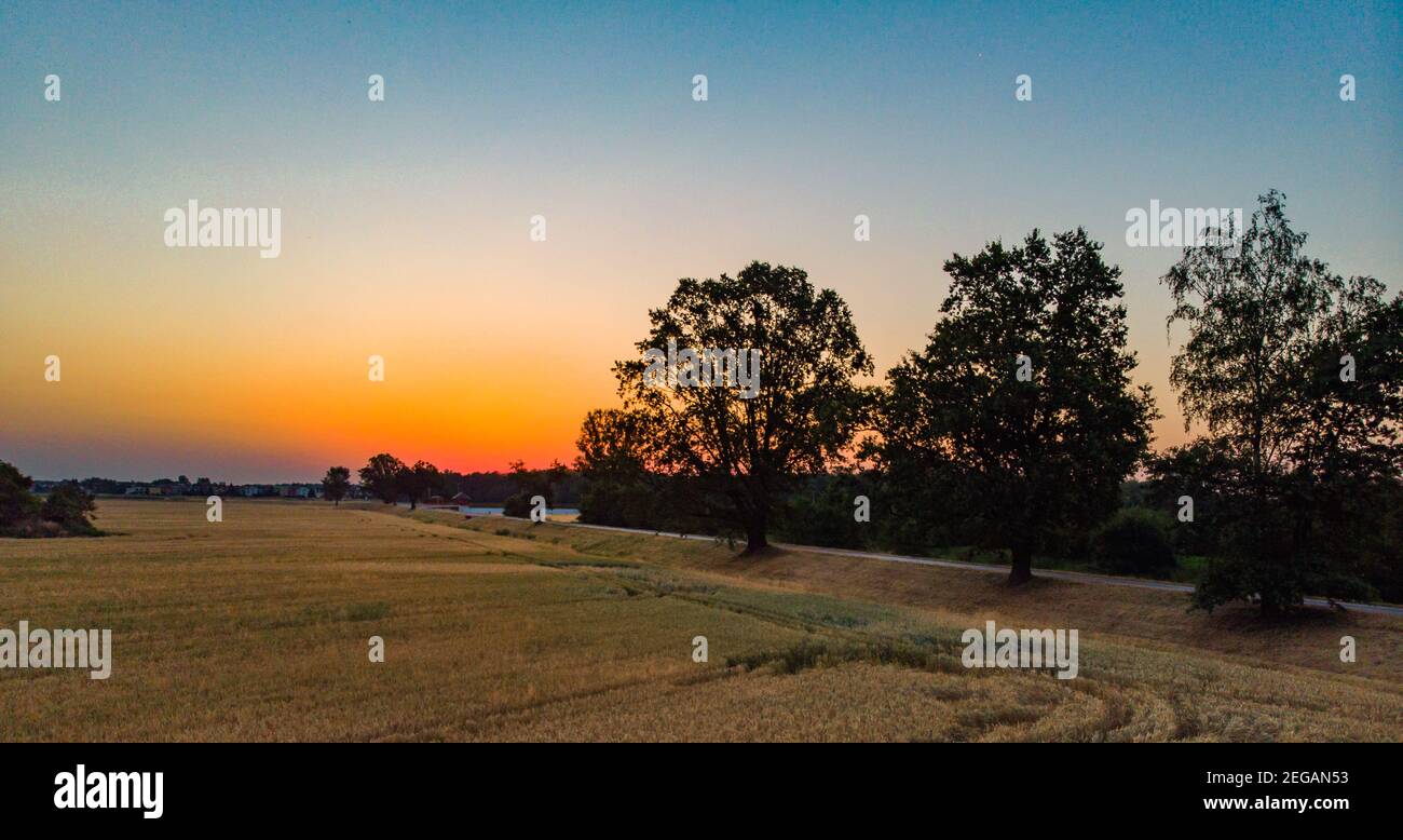 Aerial flight over grass field hi-res stock photography and images - Alamy