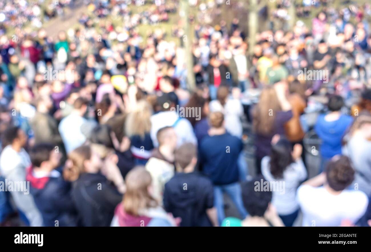 Blurred defocused crowd of people at public space - Social muster ...