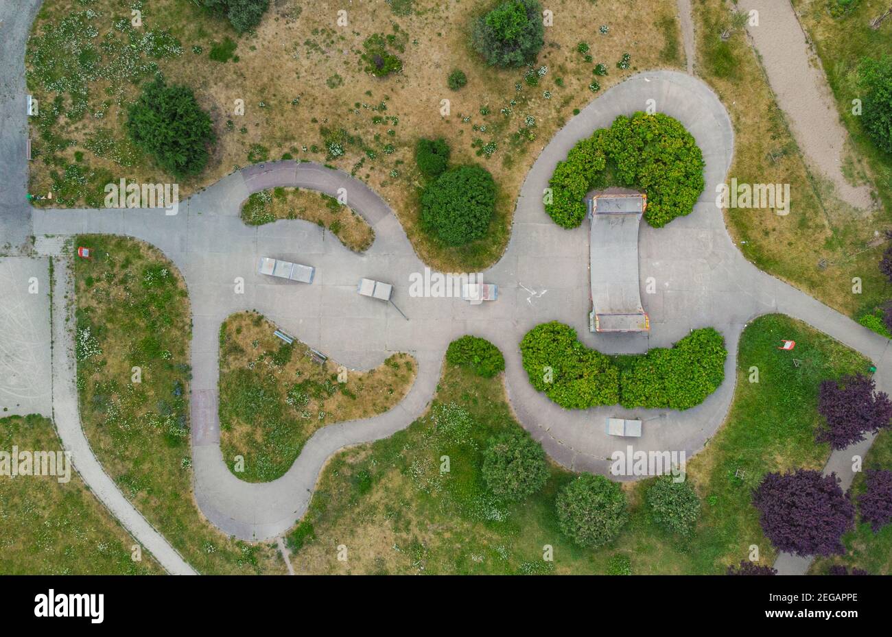 Top down aerial look to skatepark ramps near house development Stock ...