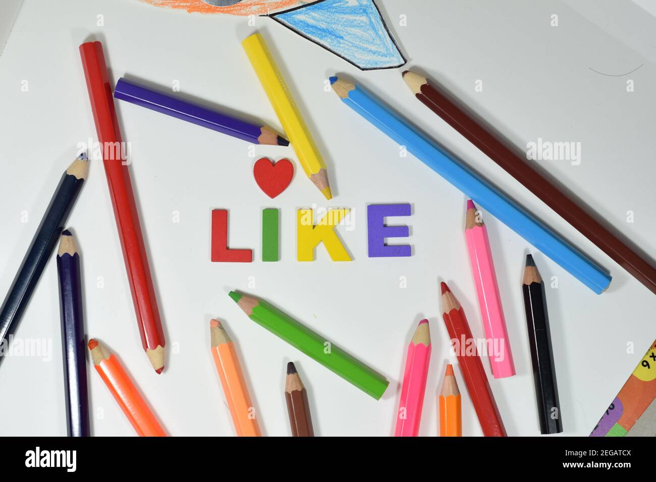 LIKE Colourful wording and Colour Pencils Isolated With White ...