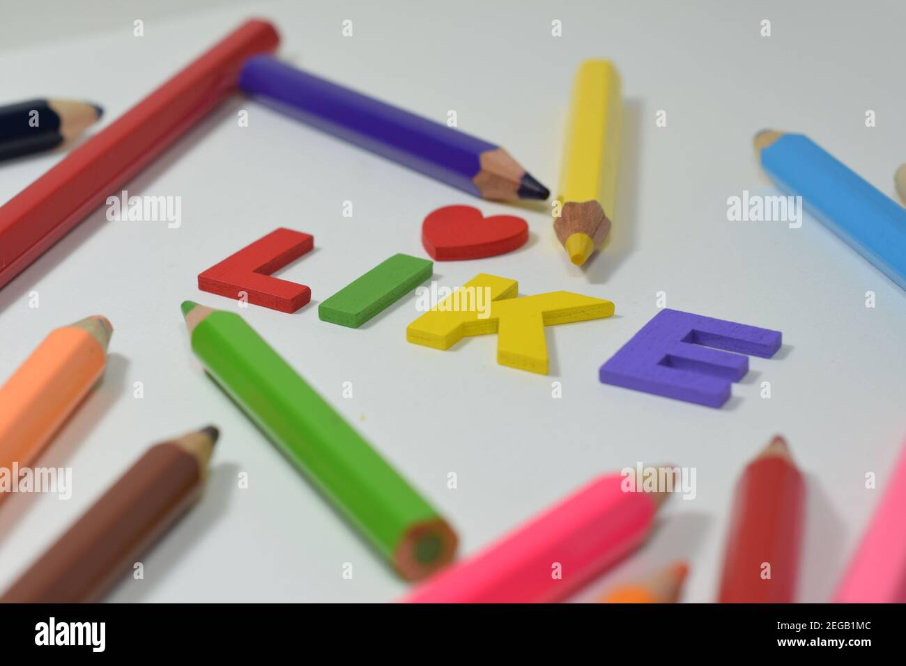 LIKE Colourful wording and Colour Pencils Isolated With White ...