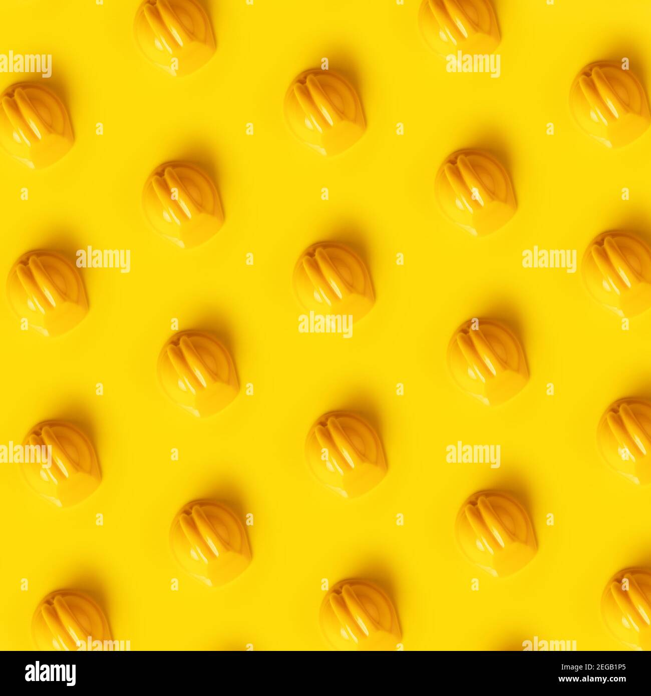 hard hat pattern over yellow background Stock Photo - Alamy