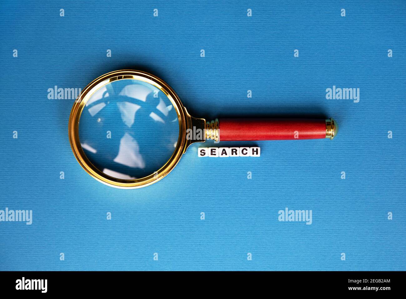 Search word through magnifying glass hi-res stock photography and ...