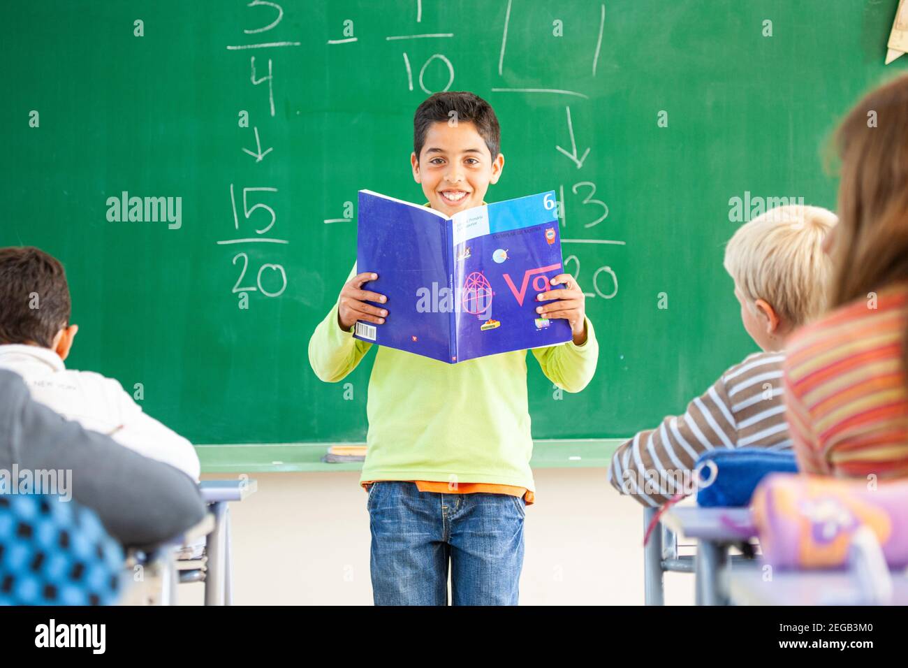 Teacher reading out loud classroom hi-res stock photography and images ...