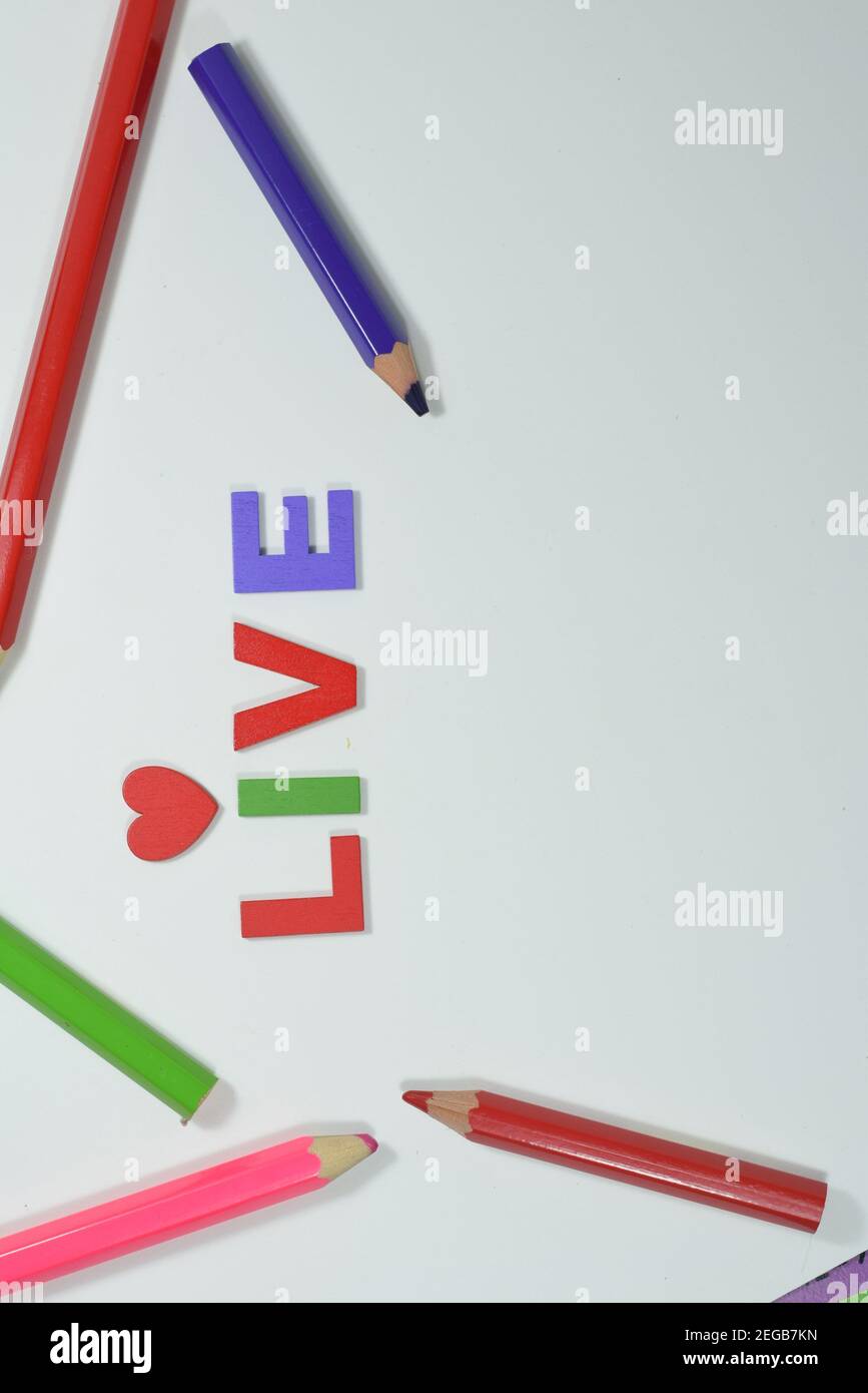 LIVE wording and Colour Pencils Isolated With White Background Stock ...
