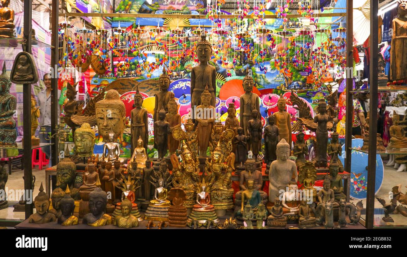 Beautiful and unique Buddha statues in a colorful shiny store Stock ...