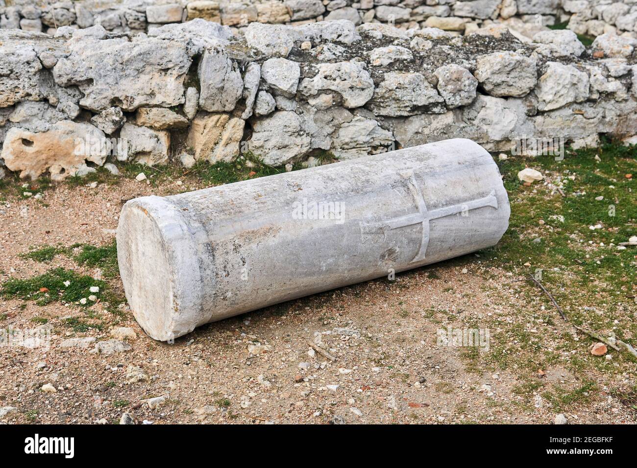 fragment of an antique column from a destroyed temple with a christian ...