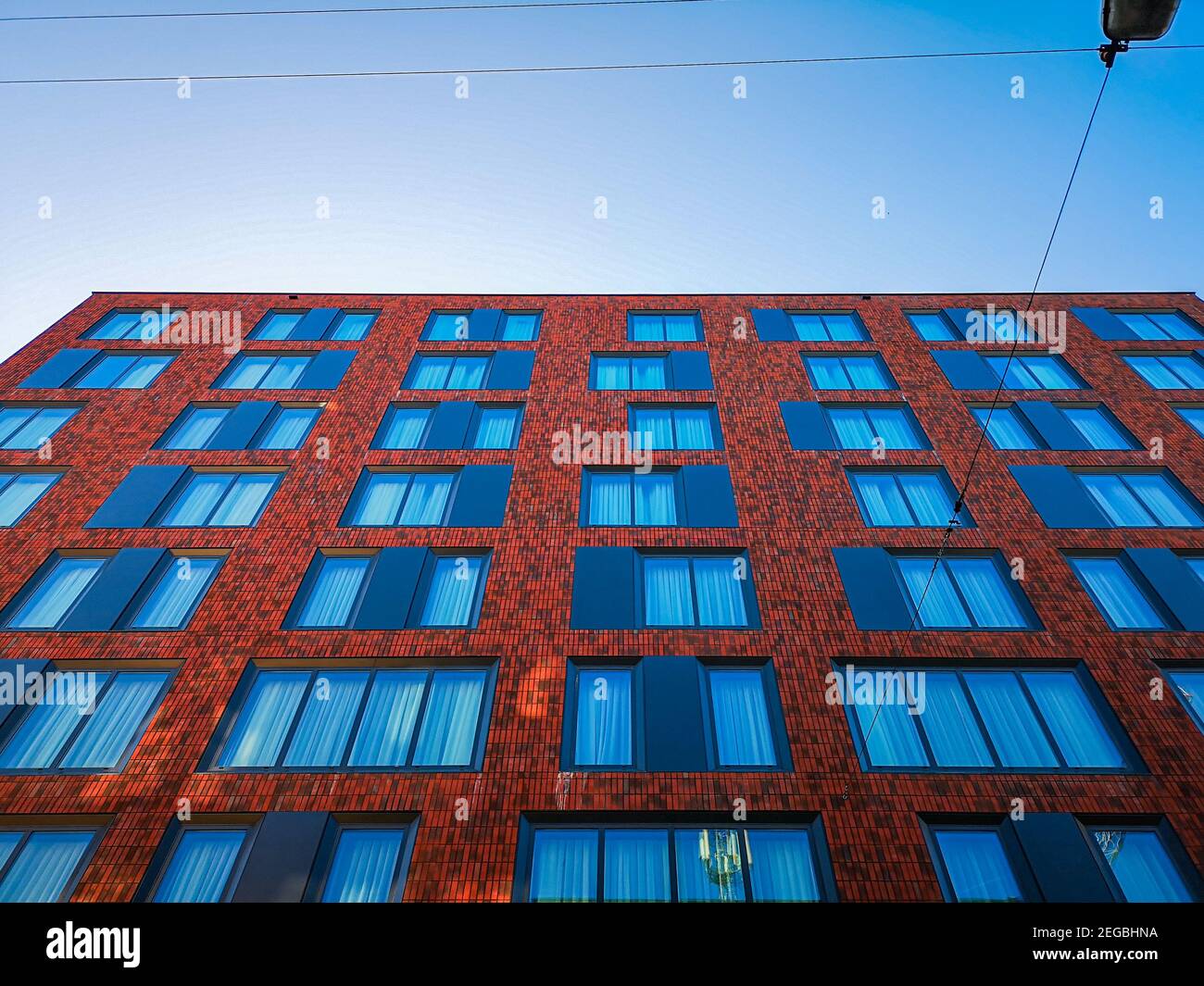 Red brick blue glass office hi-res stock photography and images - Alamy