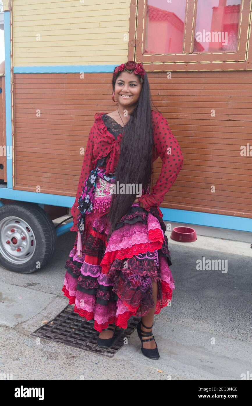 Pilgrim outside a traditional gypsy caravan after the annual Roma ...