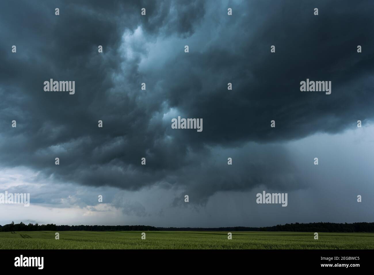 Supercell storm clouds with intense tropic rain Stock Photo - Alamy