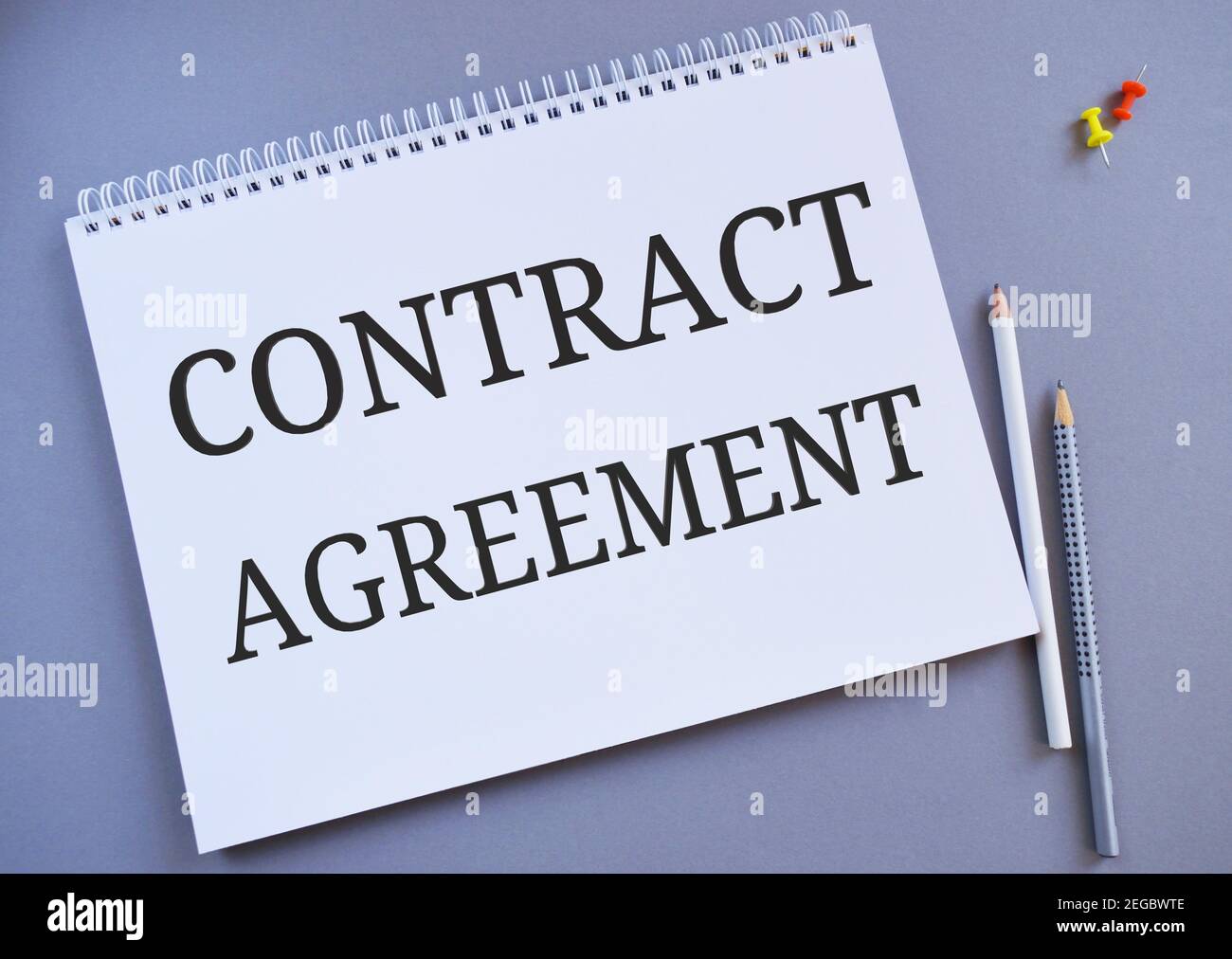 Contract agreement text written in Notebook.Gray background Stock Photo ...