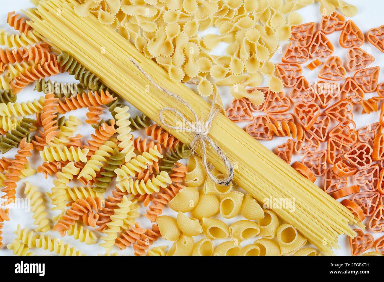 Various forms of pasta on white background Stock Photo - Alamy