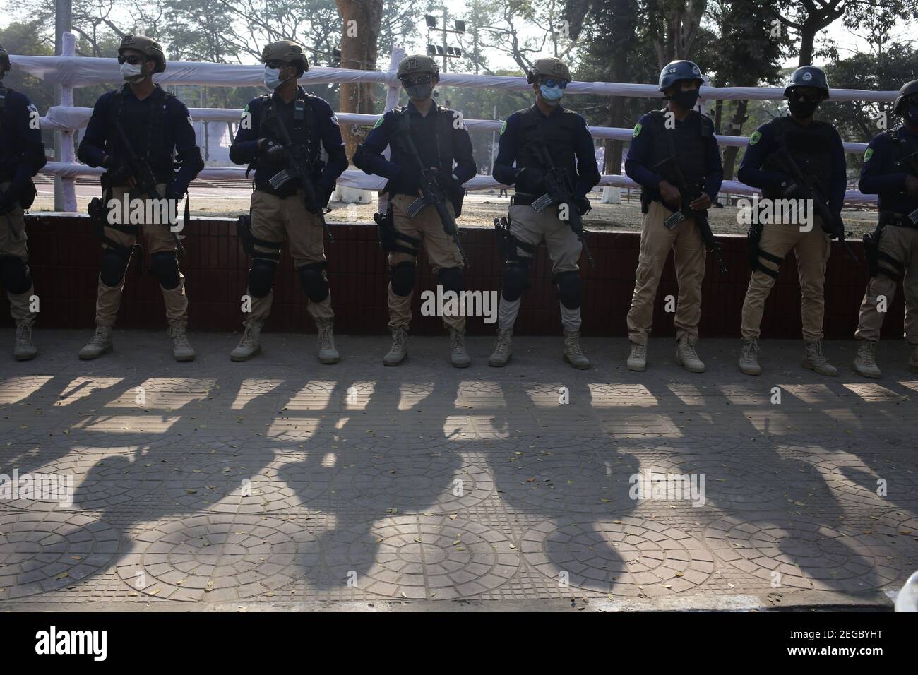 Dhaka, Bangladesh. 18th Feb, 2021. The SWAT officials are standing in ...