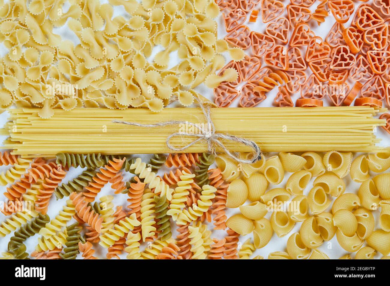 Various forms of pasta on white background Stock Photo - Alamy