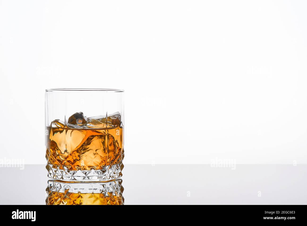 Whiskey With Ice Or Brandy In Glass With Cigar On White Background Whisky With Ice In Glass