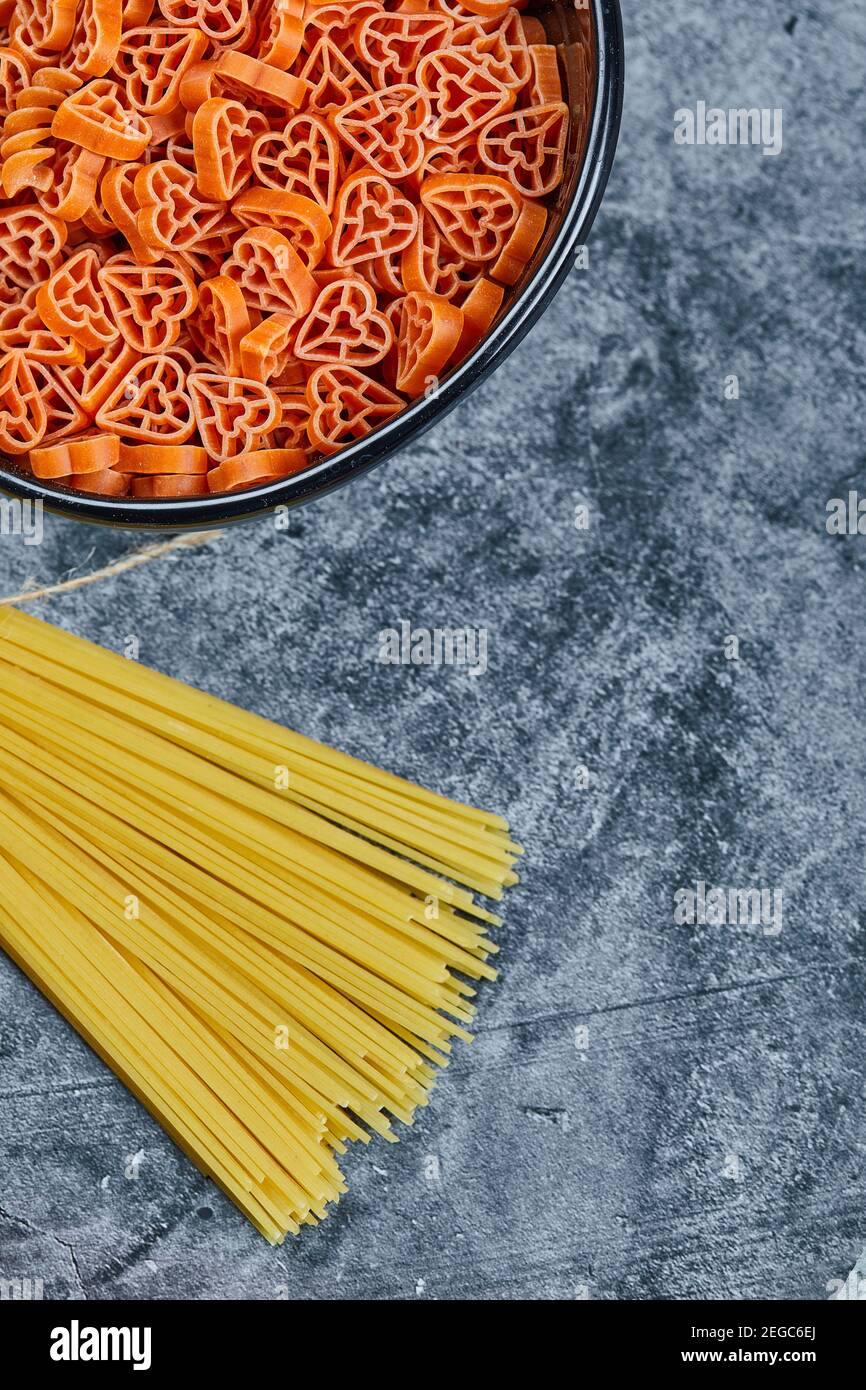 Various types of dry pasta on the marble background Stock Photo - Alamy