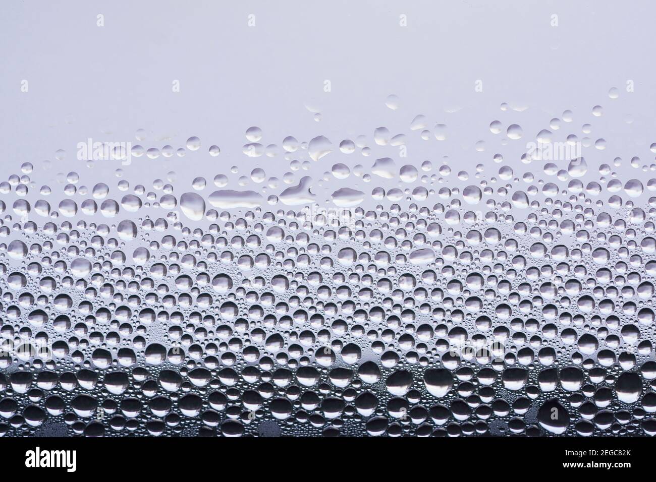 Condensation on the window. Fine drops of water on a pane of glass ...