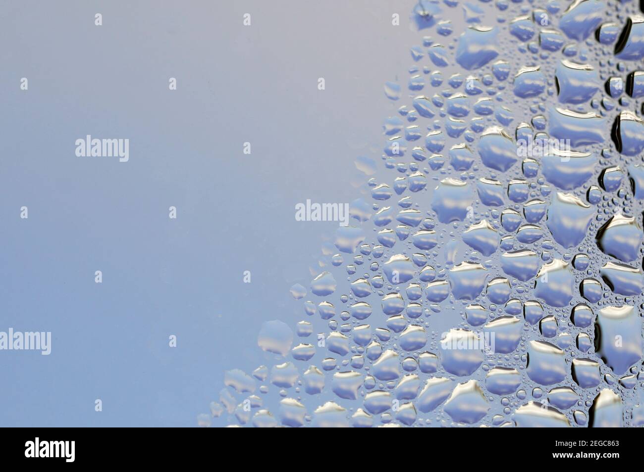 Condensation on the window. Fine drops of water on a pane of glass ...