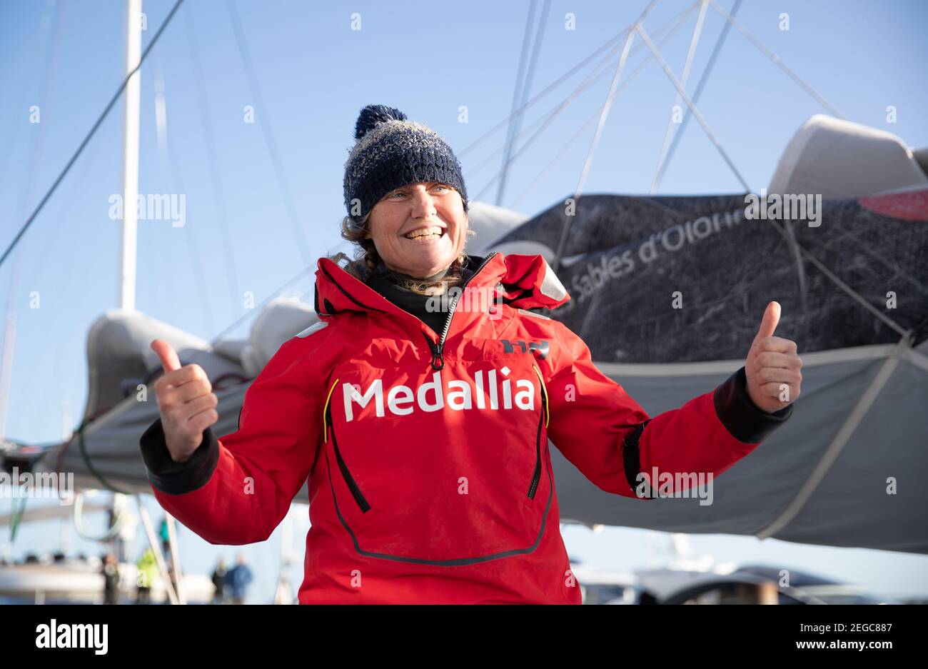 Pip Hare celebrates after arriving into Poole Quay on her boat Medallia ...