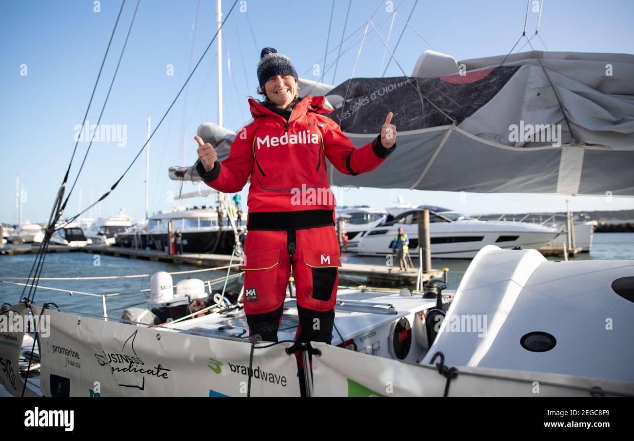 Pip Hare celebrates after arriving into Poole Quay on her boat Medallia ...
