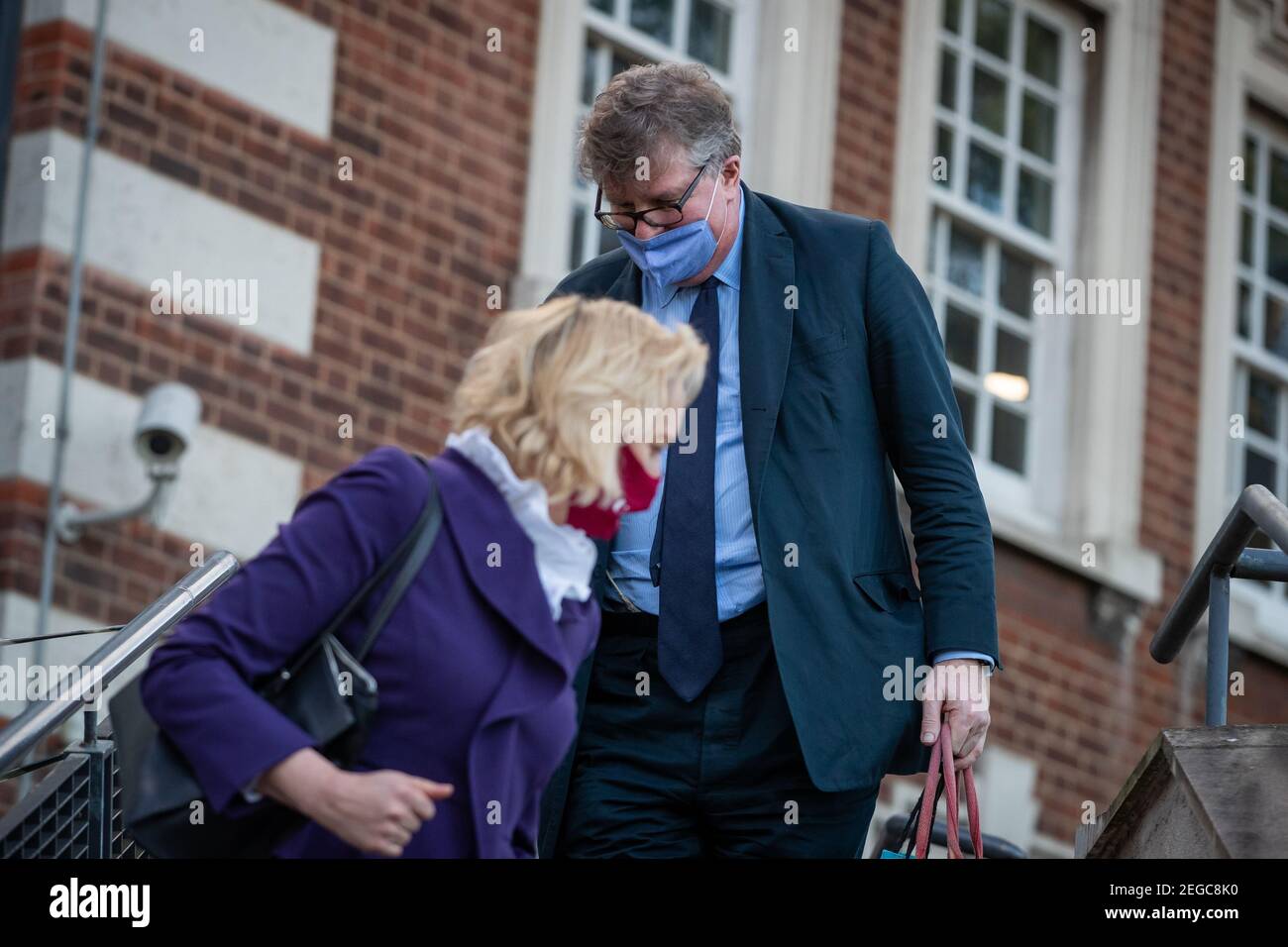 Hedge fund manager Crispin Odey, next to his wife Nichola Pease as they ...