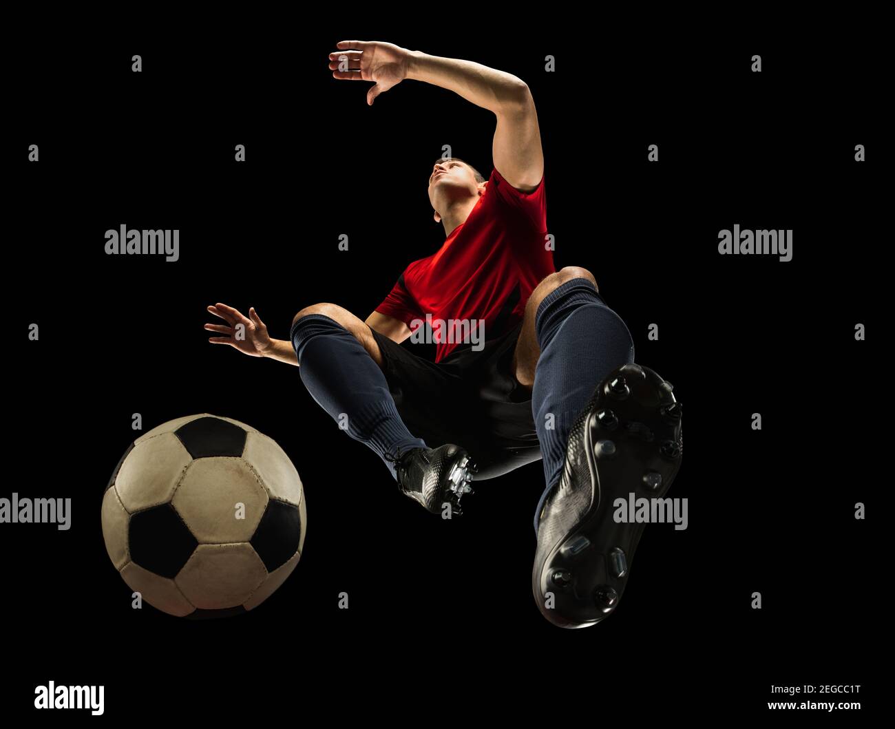 Young caucasian football, soccer player in action, motion isolated on ...