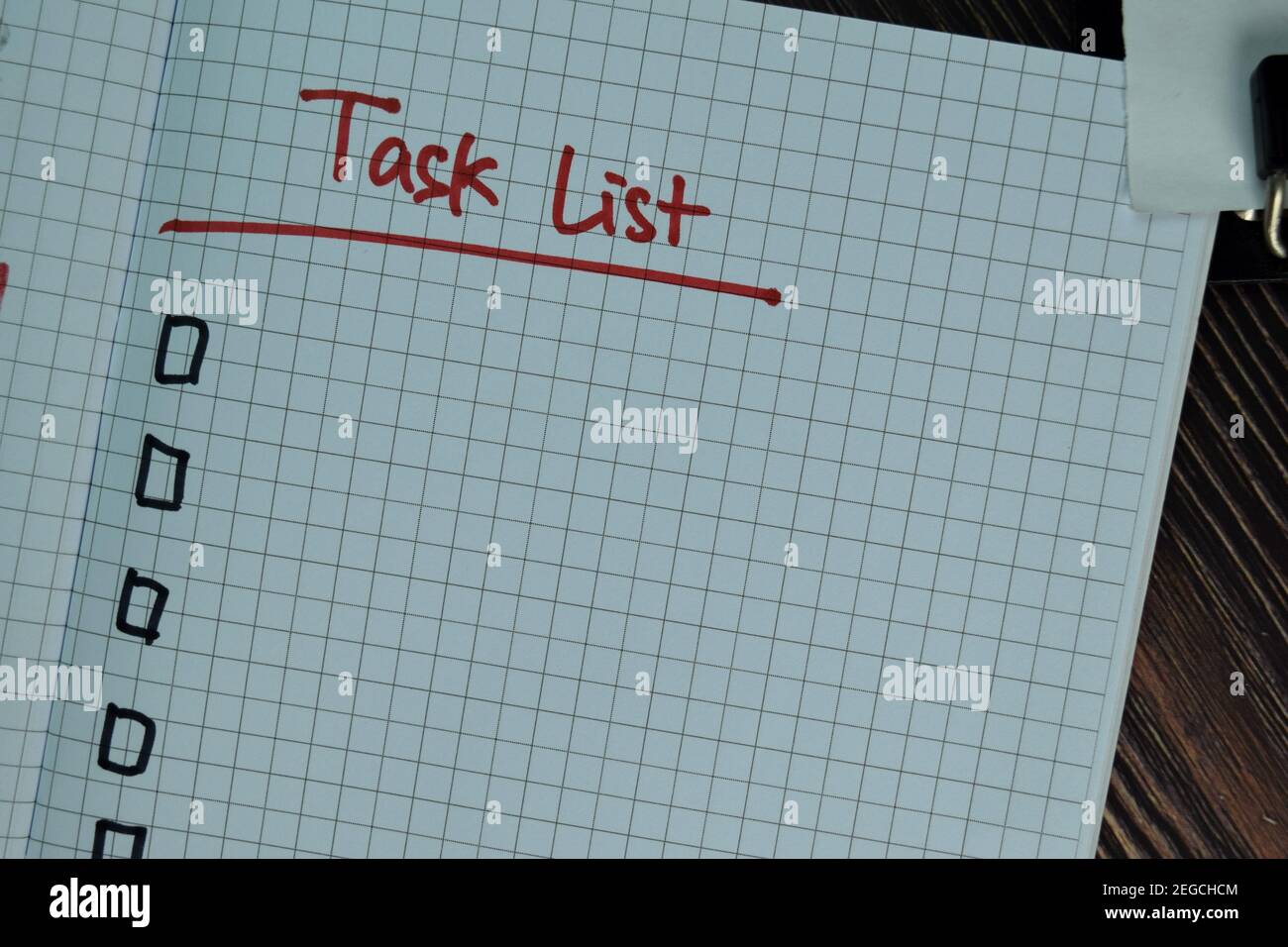 Task List write on a book and supported by additional services isolated ...