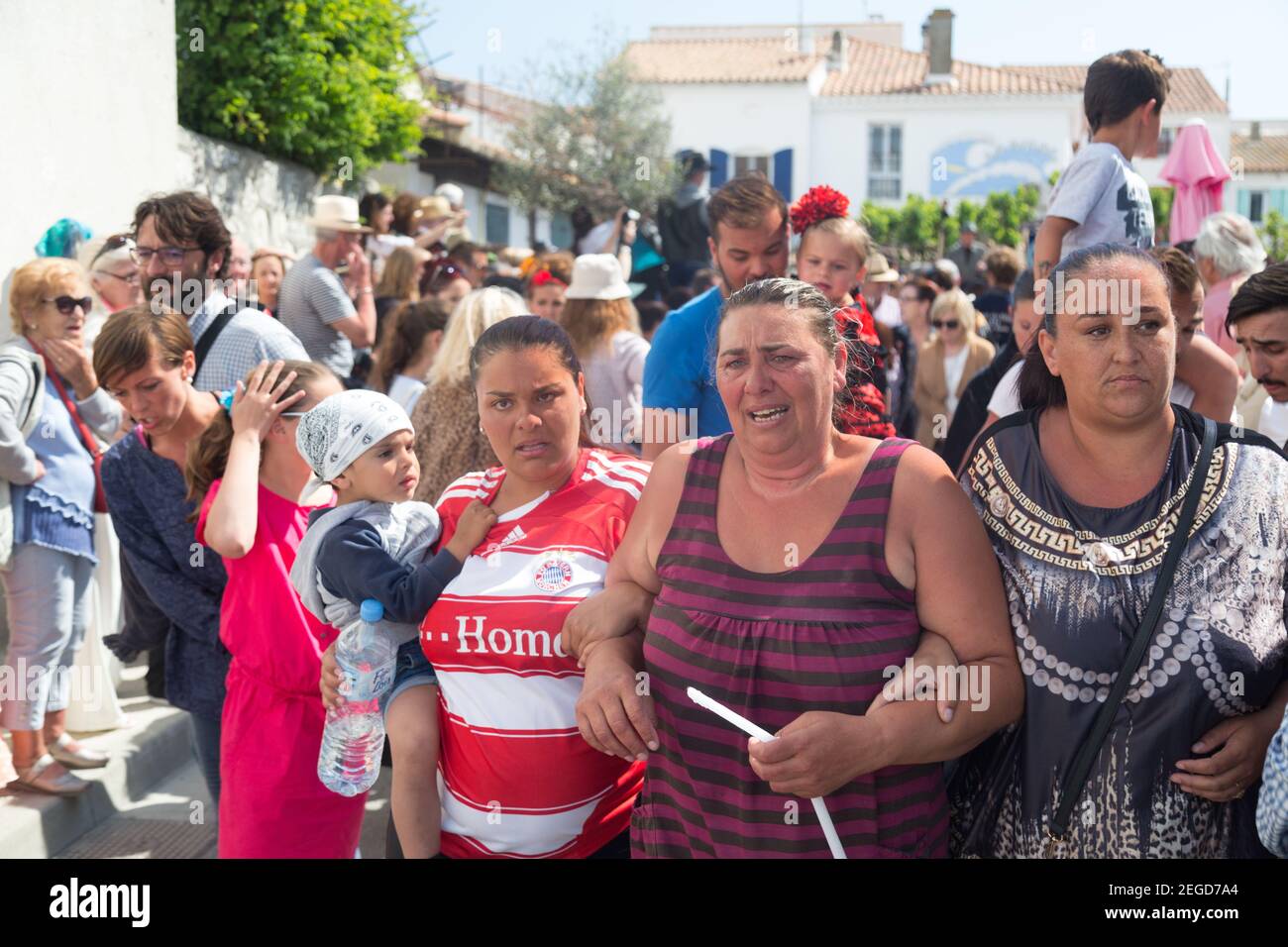 Roma and other participants accompany the statue of the Gypsy Patron ...