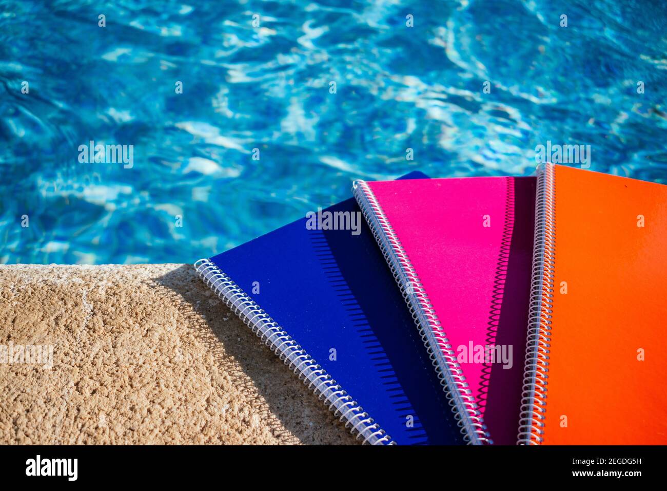 Pile of notebooks blue hi-res stock photography and images - Alamy