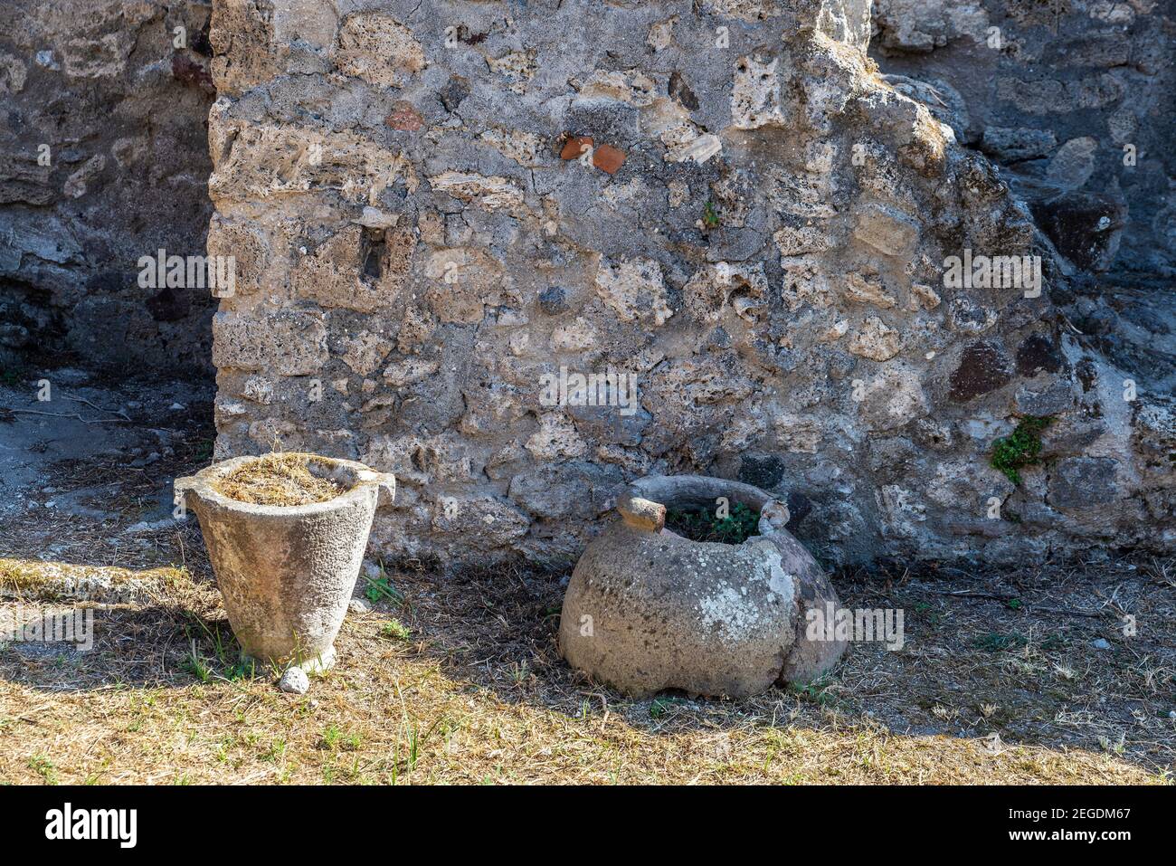 Pot and bucket in the roman ruins of the ancient archaeological site of ...