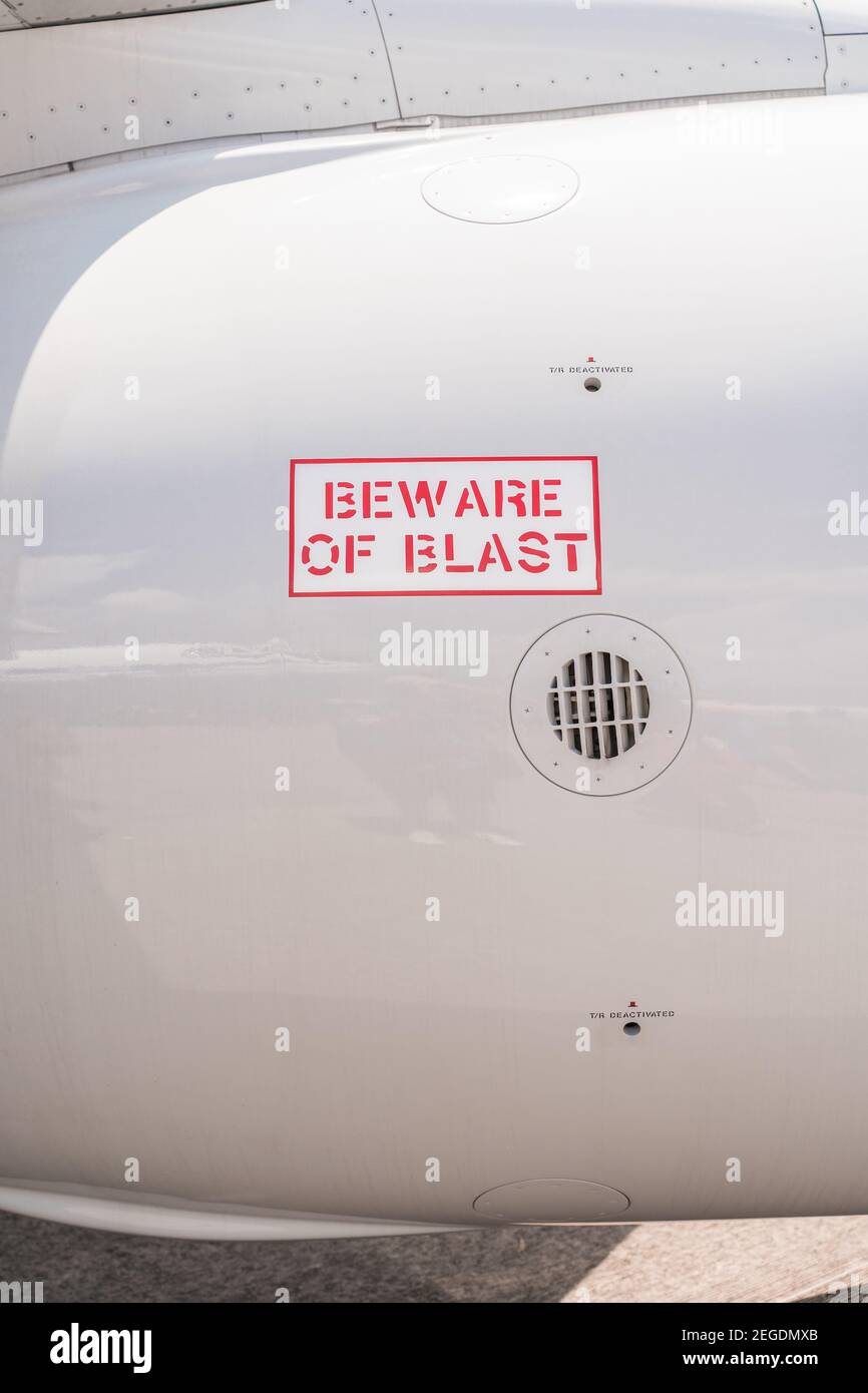 Closeup of "BEWARE OF BLAST" written on a white airplane Stock Photo ...