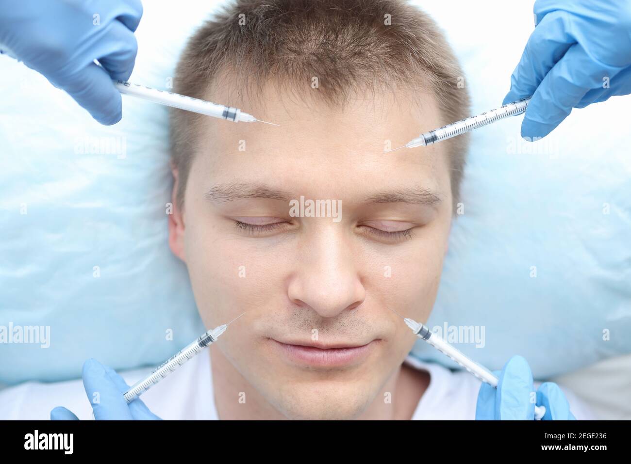 Male patient is given multiple injections into facial skin Stock Photo ...