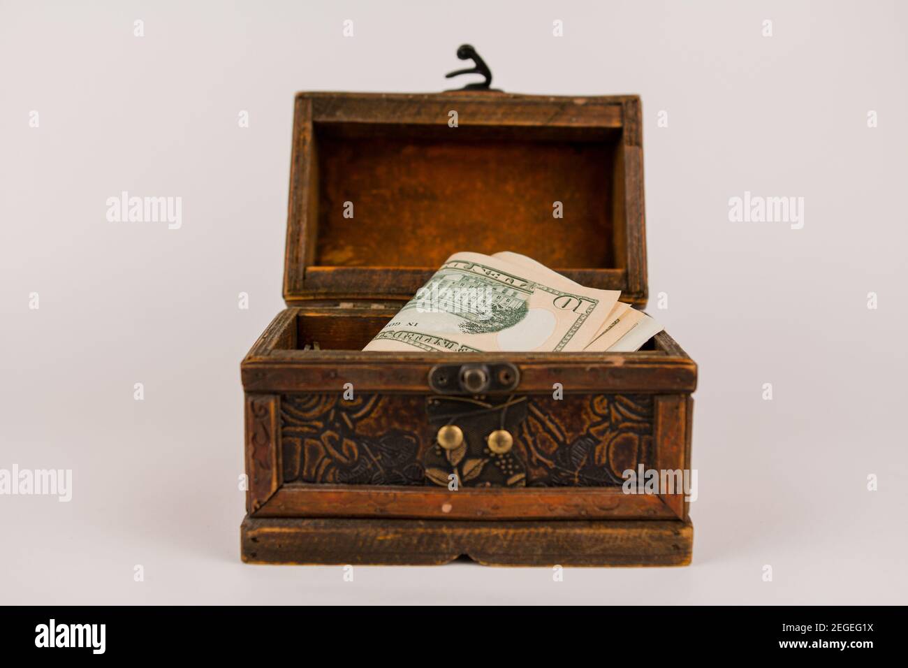 paper money dollars in a wooden chest Stock Photo - Alamy