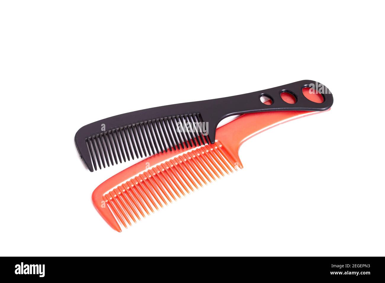 Two plastic combs isolated on a white background Stock Photo - Alamy