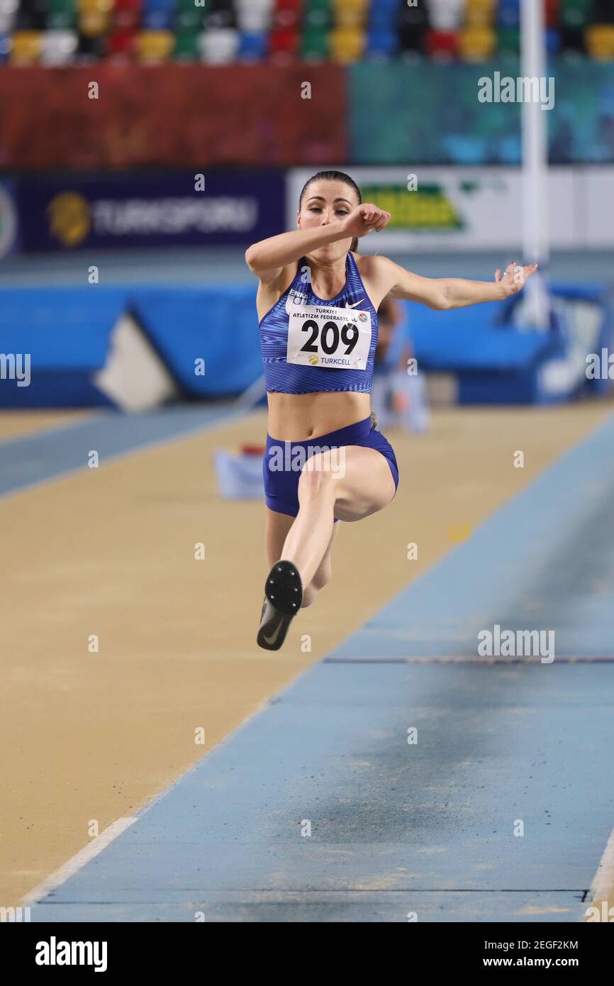 ISTANBUL, TURKEY - FEBRUARY 07, 2021: Undefined athlete triple jumping ...
