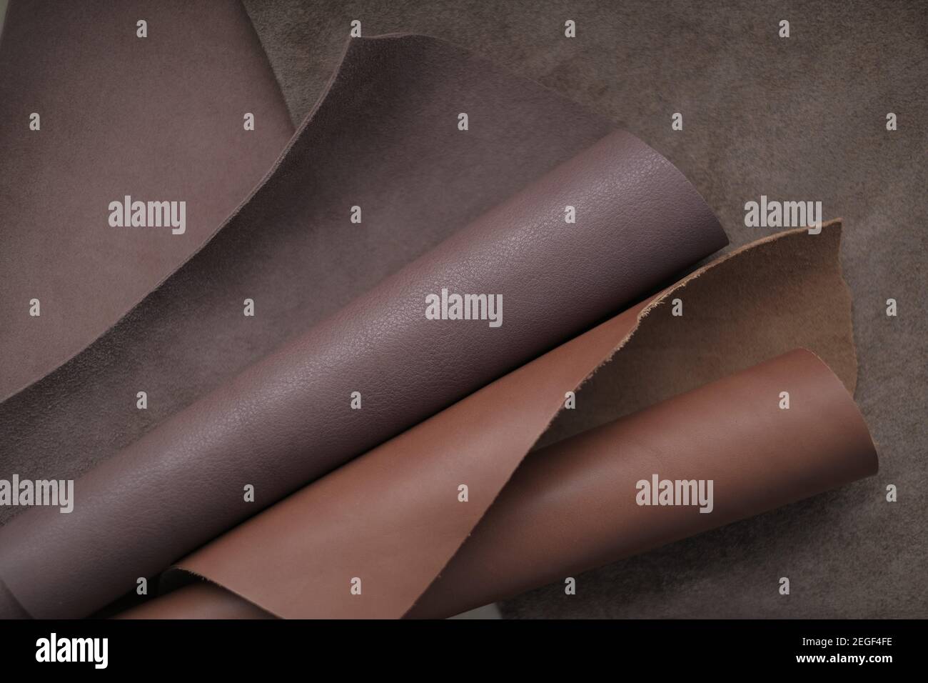 Brown genuine leather roll.real leather set. Leather in rolls on a ...