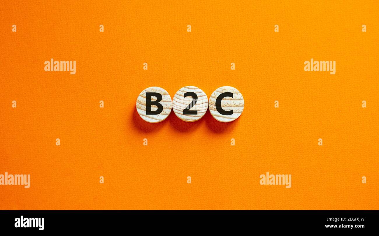 B2C, business to customer symbol. Wooden circles with word 'B2C ...