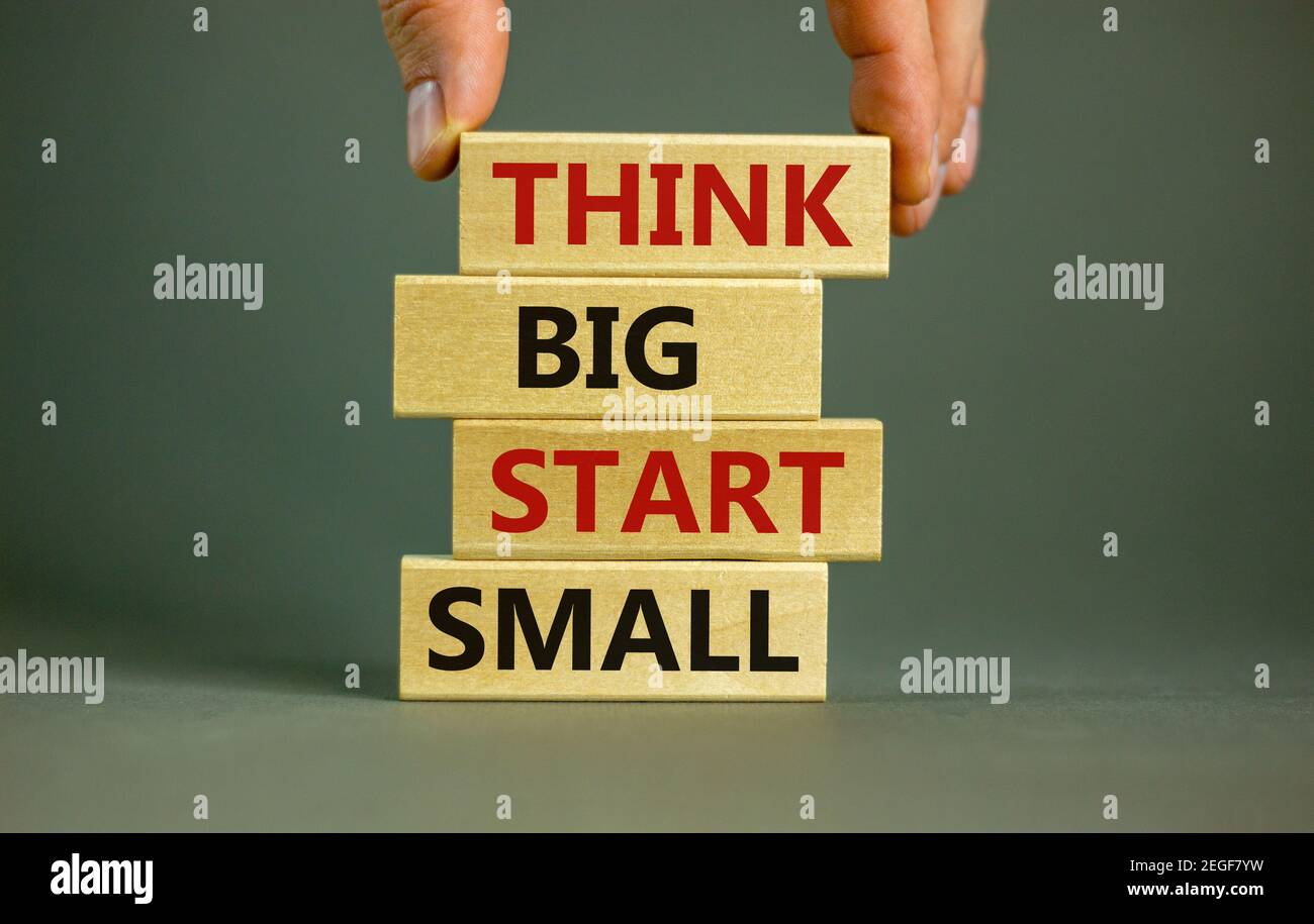 Think big start small symbol. Concept words 'Think big start small' on ...
